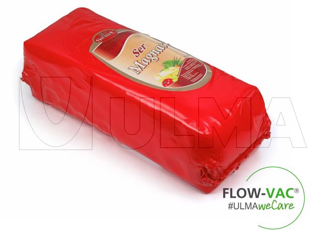 Упакока сырных блоков в вакуумные пакеты с помощью системы Flow-Vac ...